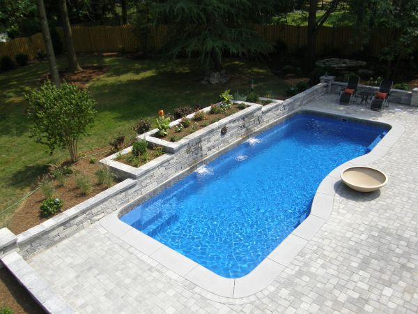 5 Seamless Ways to Integrate a Retaining Wall into Your Pool Project