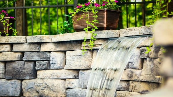 Pool Retaining Walls for Sloped Yards: Cost, Materials, and More